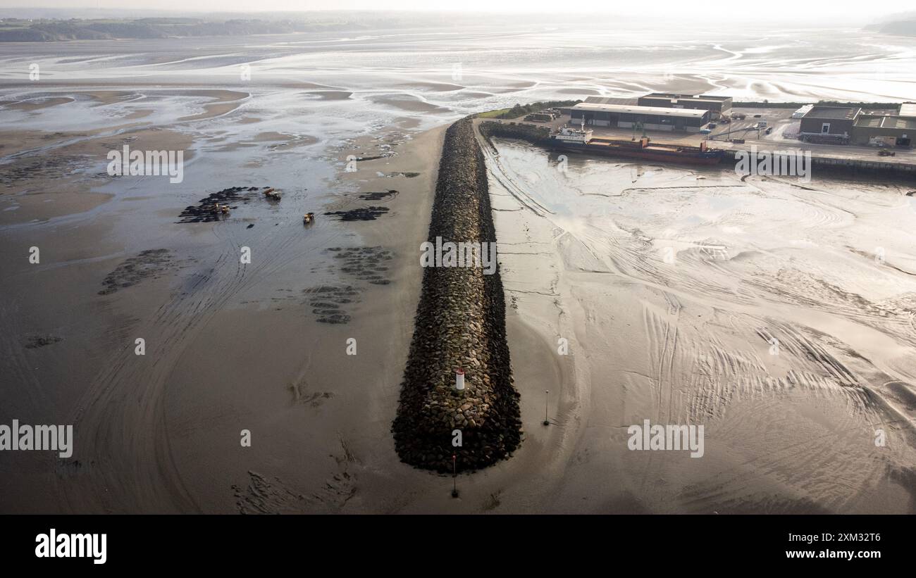 Aerial photograph of lorries carrying out desilting work on the the ...