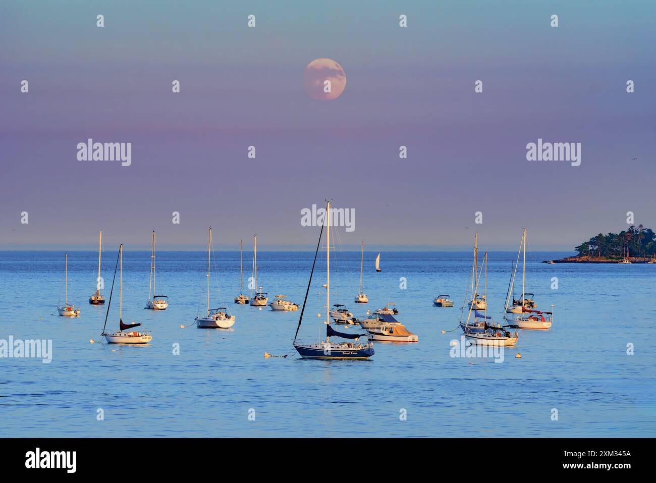 Buck Moon Rising Over the Channel Horizontal Stock Photo - Alamy