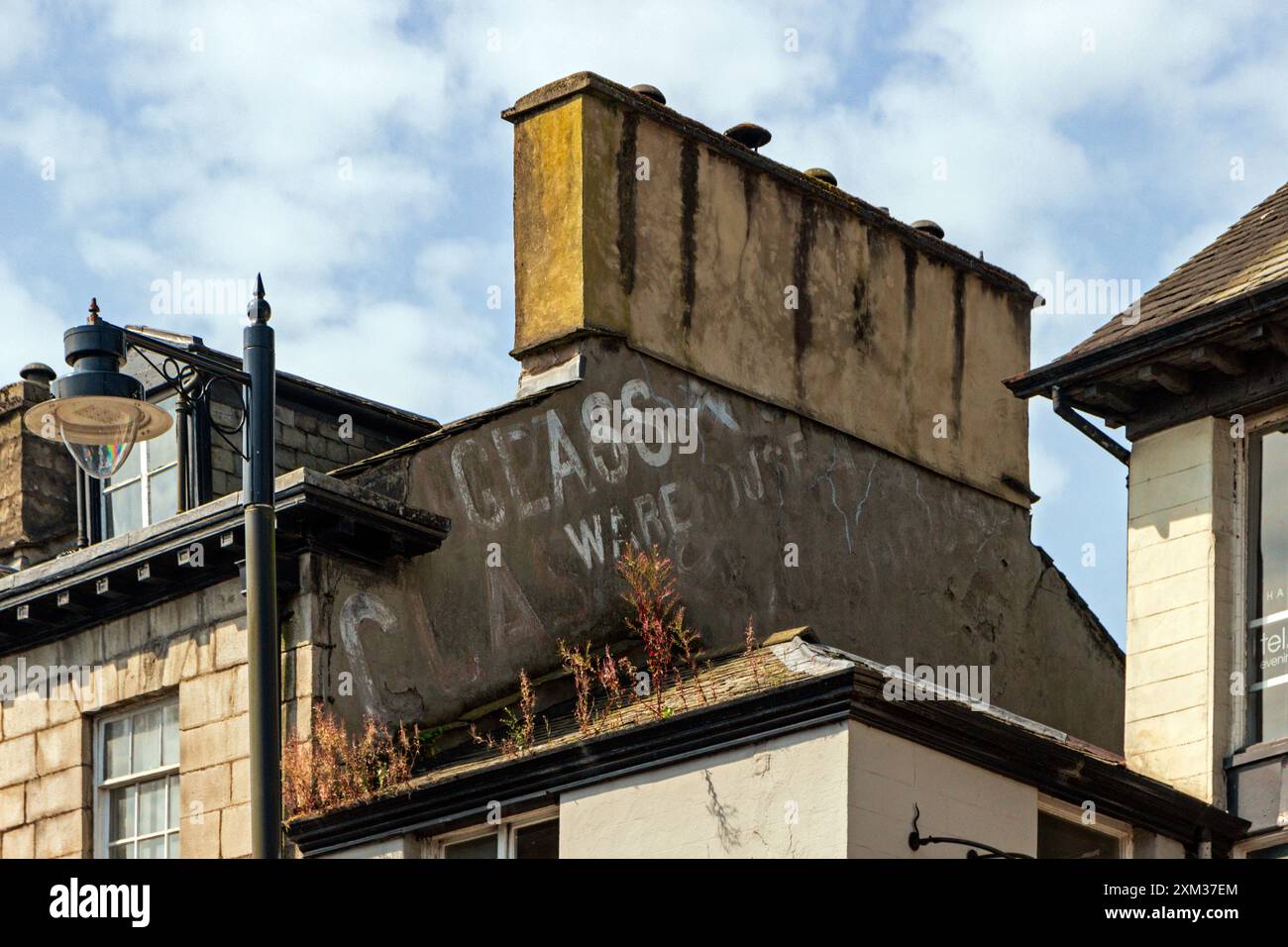 Ghost sign for a glass warehouse. Highgate, Kendal Stock Photo - Alamy