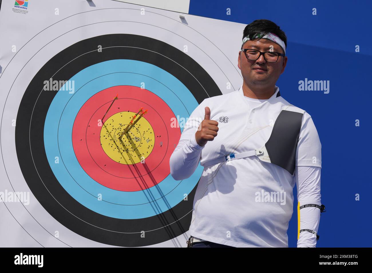 South Korea's Kim Woo-jin celebrates after the men's archery individual ...