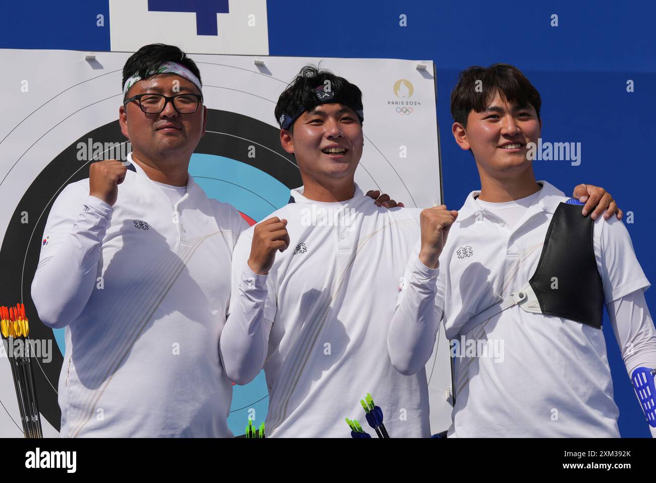From left, South Korea's Kim Woo-jin, Lee Woo-seok and Kim Je-deok ...
