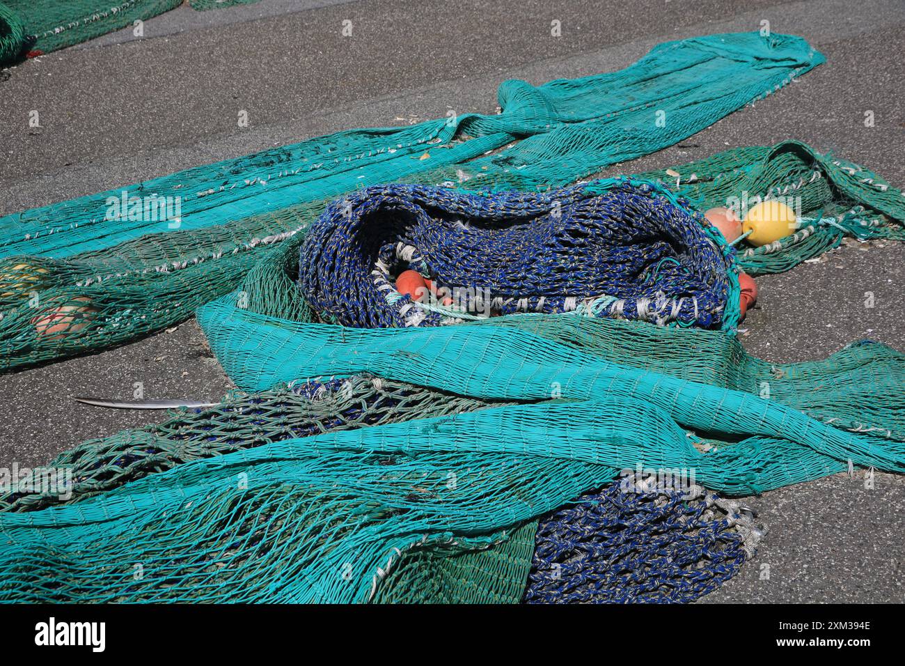 Nylon fishing net drying in the harbour of Hirtshals, Denmark Stock ...