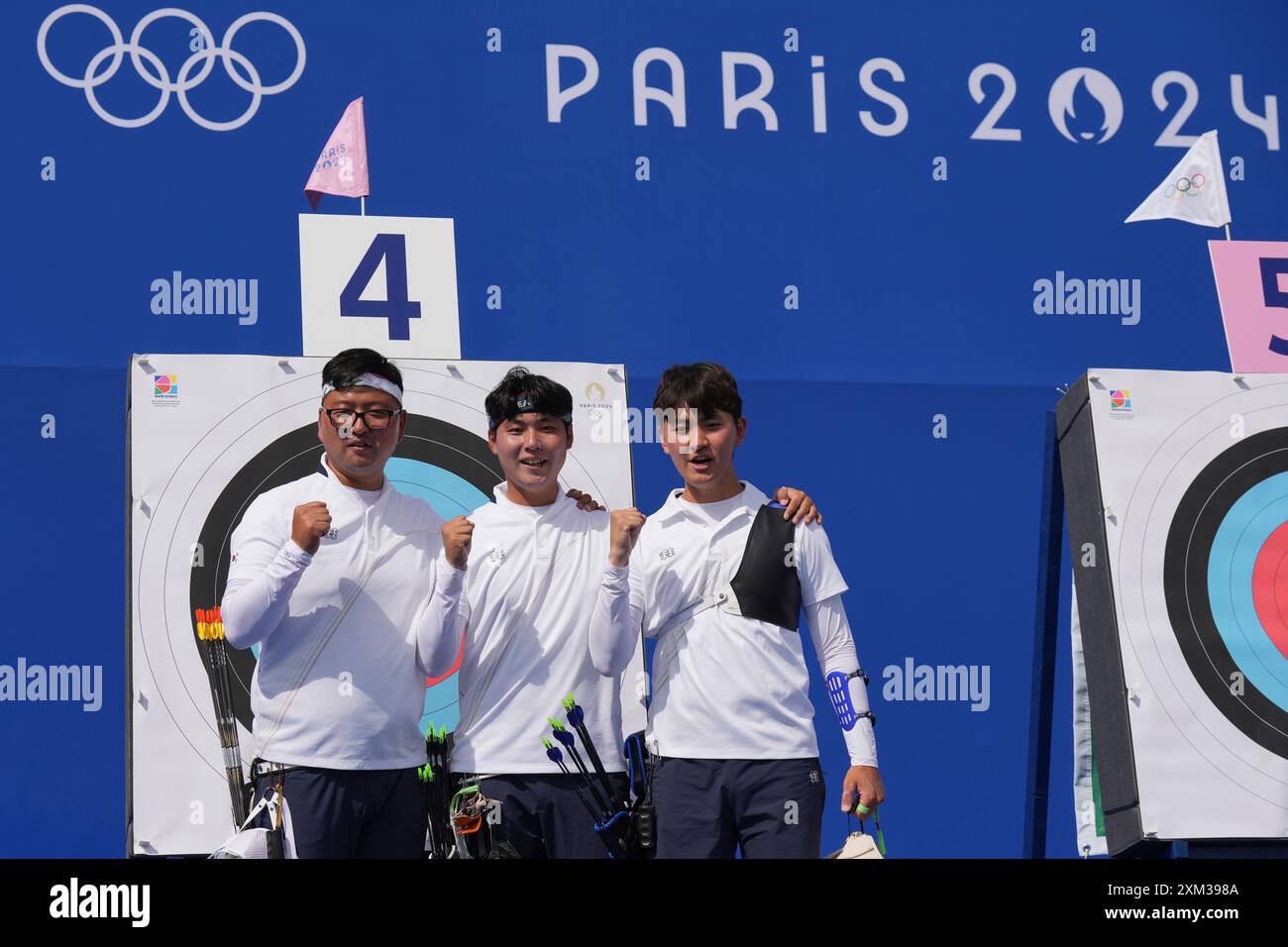 From left, South Korea's Kim Woo-jin, Lee Woo-seok and Kim Je-deok ...