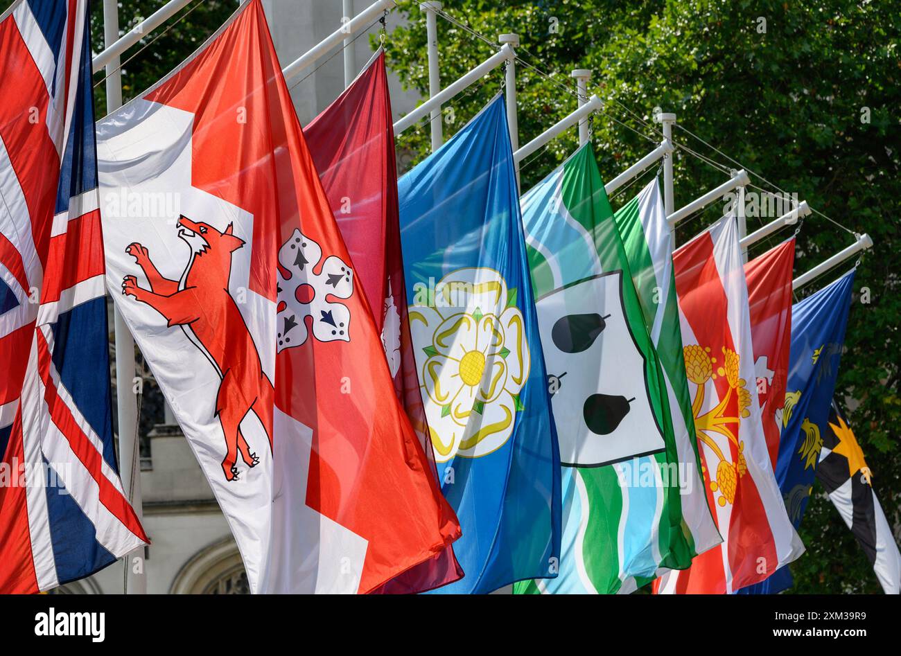 London, UK. Flags of Historic English Counties flying in Parliament ...