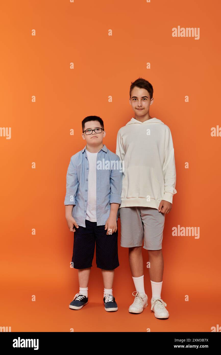 Two young boys stand hi-res stock photography and images - Alamy