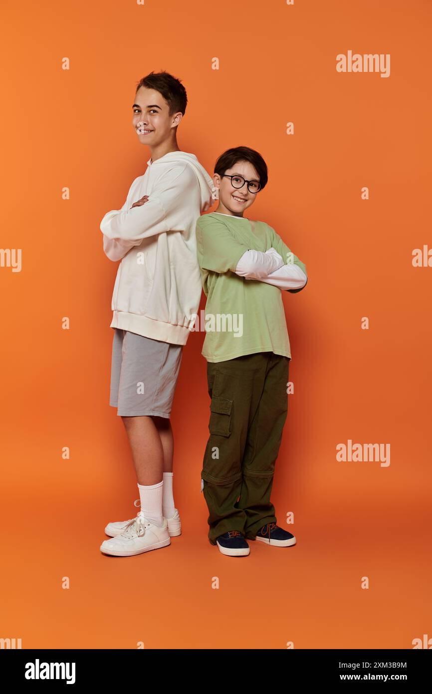 Two young boys stand hi-res stock photography and images - Alamy