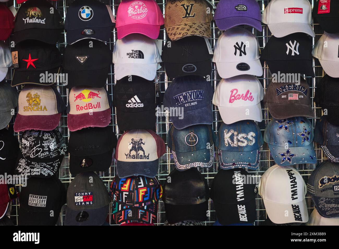 Cap street vendor in Pattaya, Thailand Stock Photo - Alamy