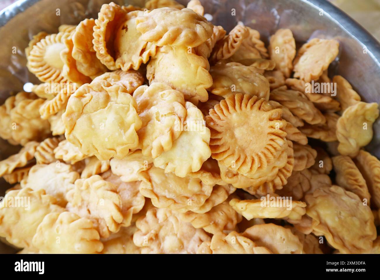 Pile of Fried Kuih Tart Crust, a Pineapple Jam Topped Bite-size Tart ...