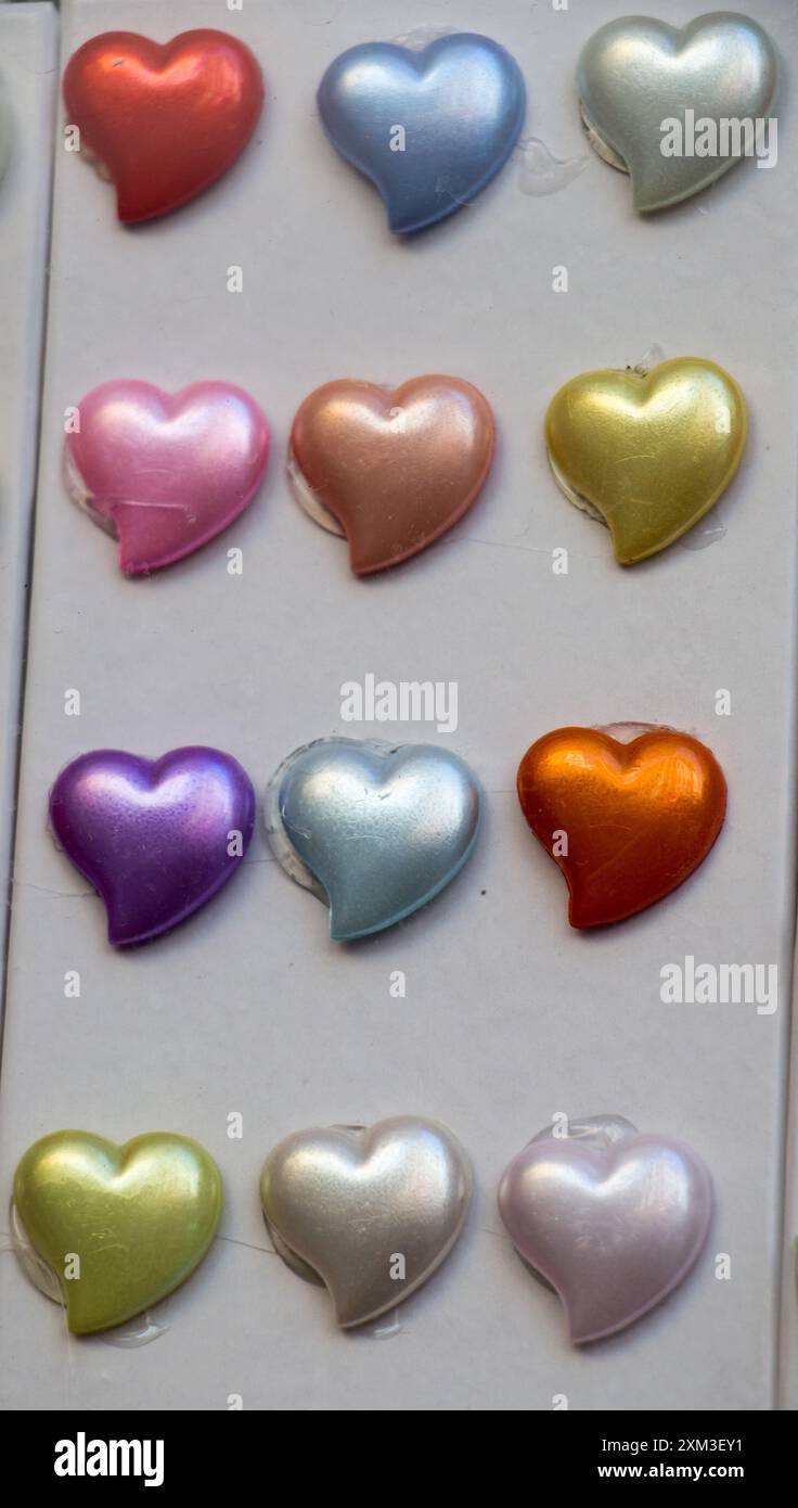 Colorful decorative objects in the shape of a heart Stock Photo - Alamy