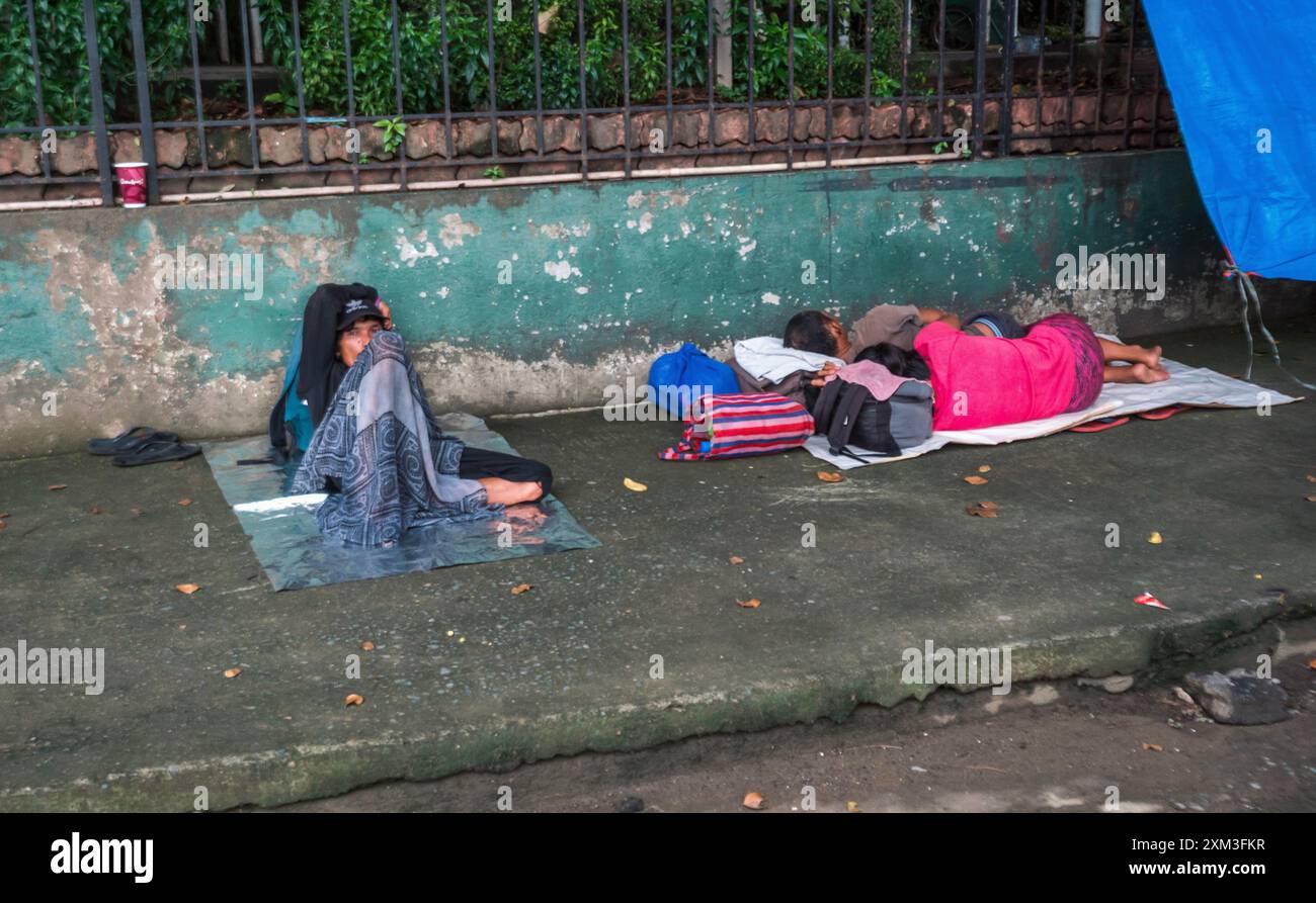 Manila, Philippines - August 25, 2019: Homeless people sleeping on ...