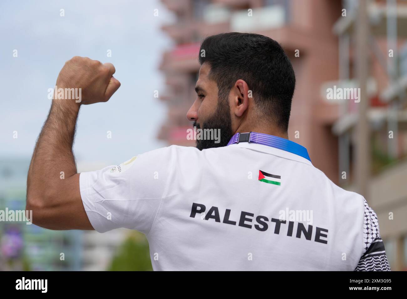 A athlete from Palestine at the Olympic Village during the Olympic ...