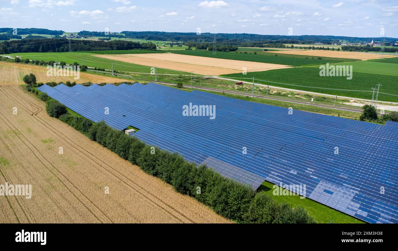 Bavaria, Germany - July 25, 2024: Solar installation in the middle of an agricultural field ...