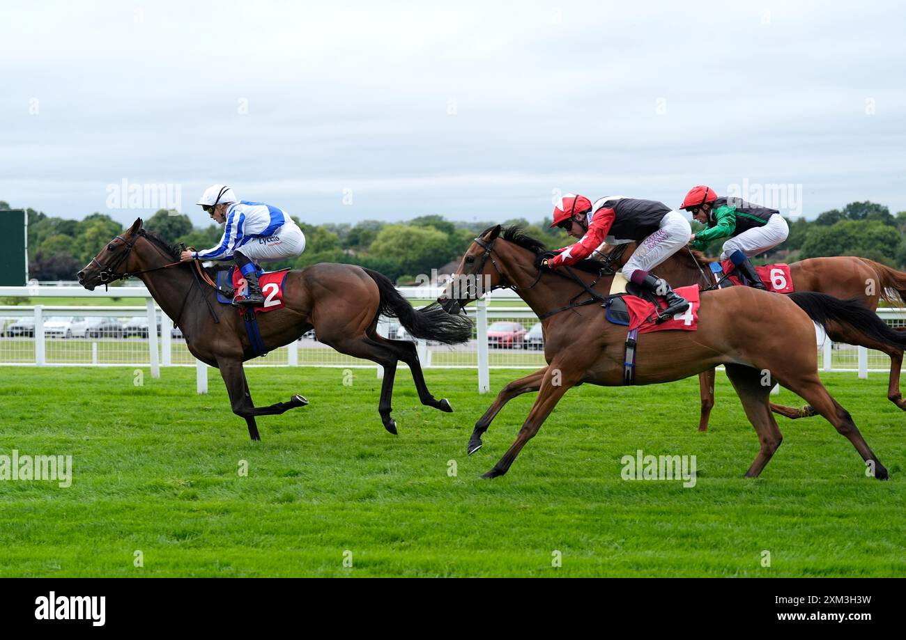 Laura Bay ridden by Benoit De La Sayette (left) coming home to win the ...