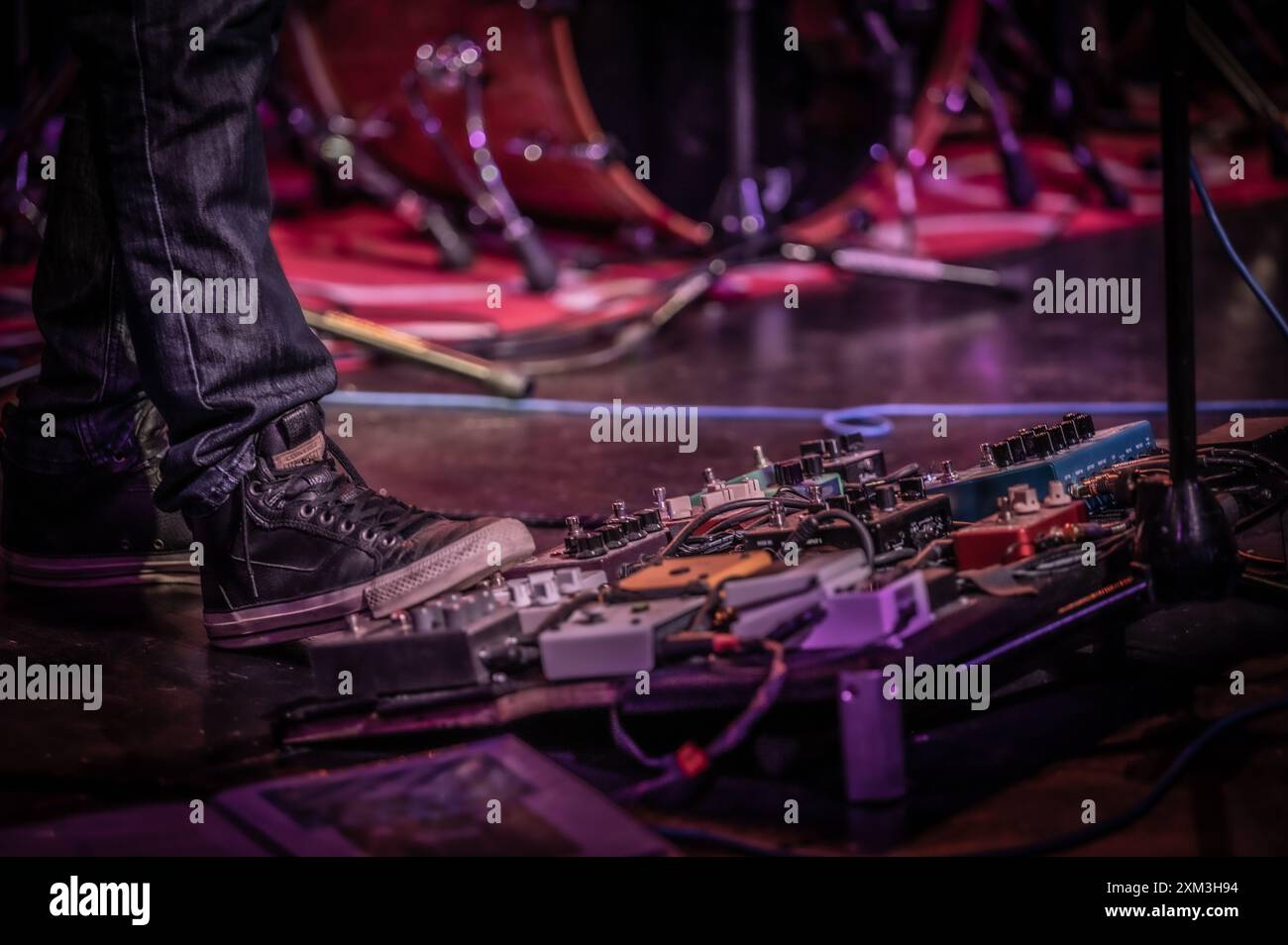 Guitar effects on stage at a live concert Stock Photo - Alamy
