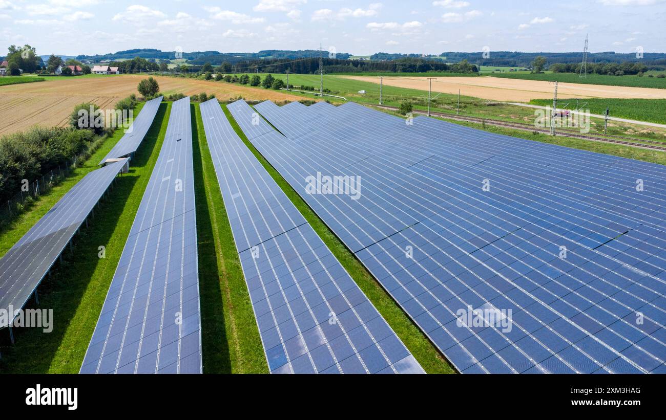 Bavaria, Germany - July 25, 2024: Solar installation in the middle of an agricultural field ...