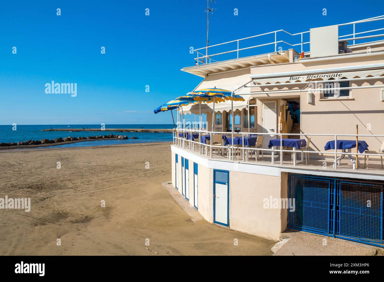 Restaurant / bar on beautiful beach near Rome, Italy Stock Photo - Alamy