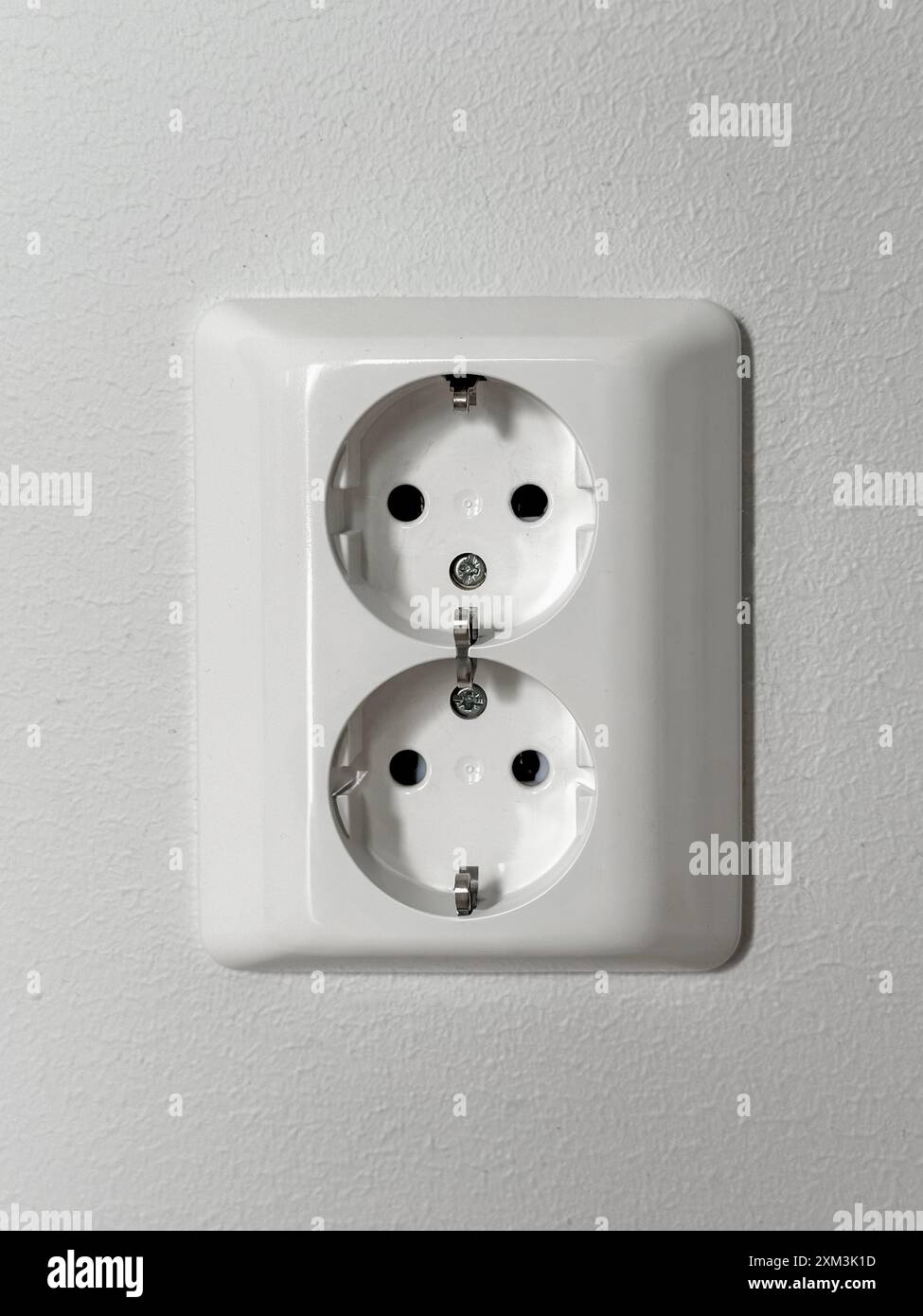 White electric socket on the wall Stock Photo - Alamy