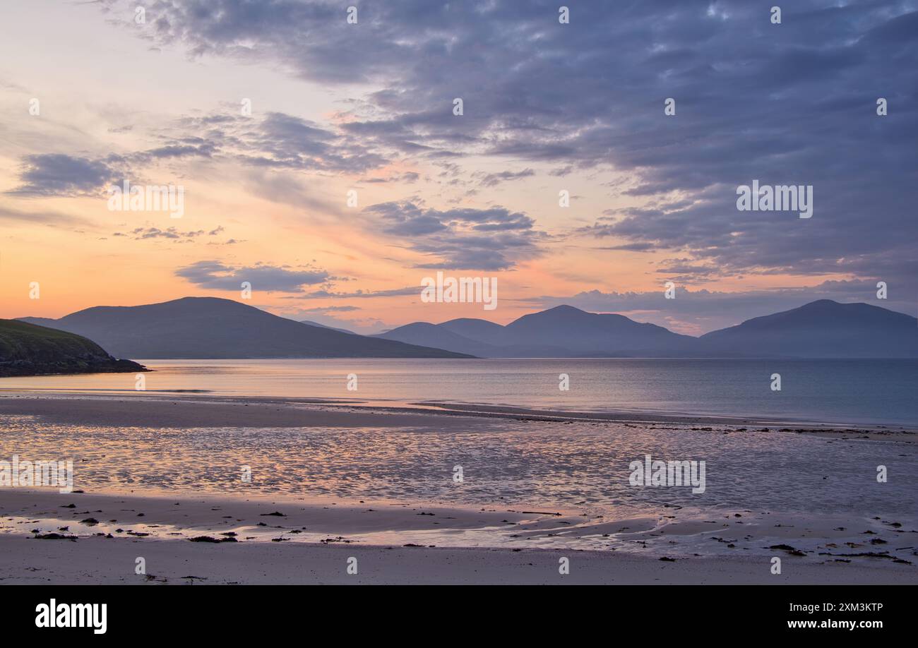 Beautiful colours from a gentle sunset over the calm sea in South ...