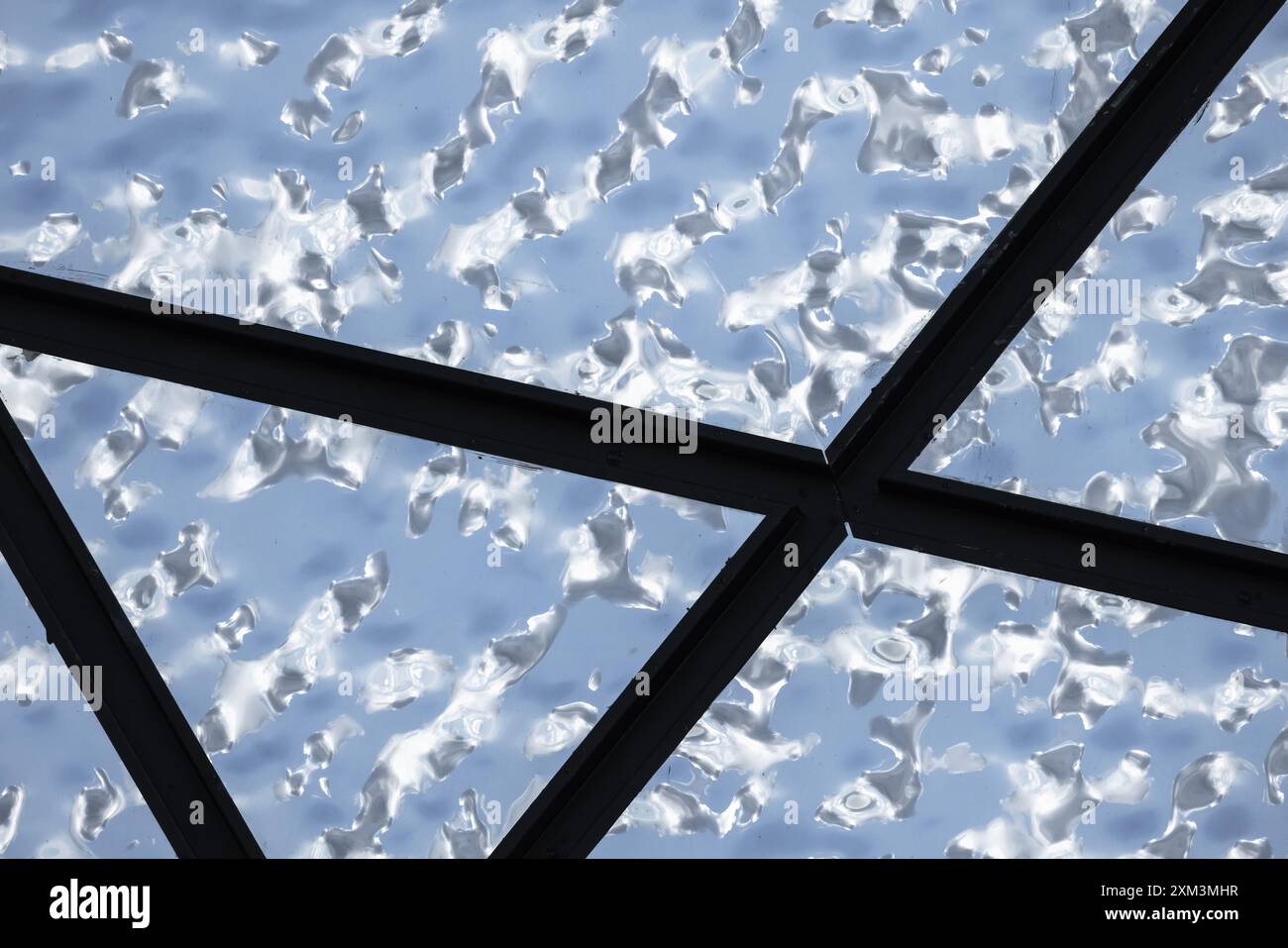 Abstract background photo with, rippled shiny metal wall structure ...