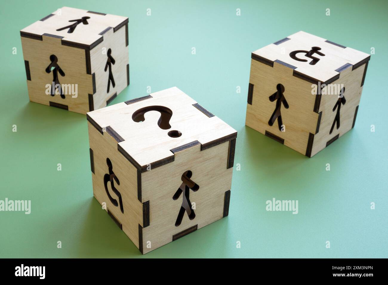 Inclusive onboarding strategy. Cubes with figures Stock Photo - Alamy
