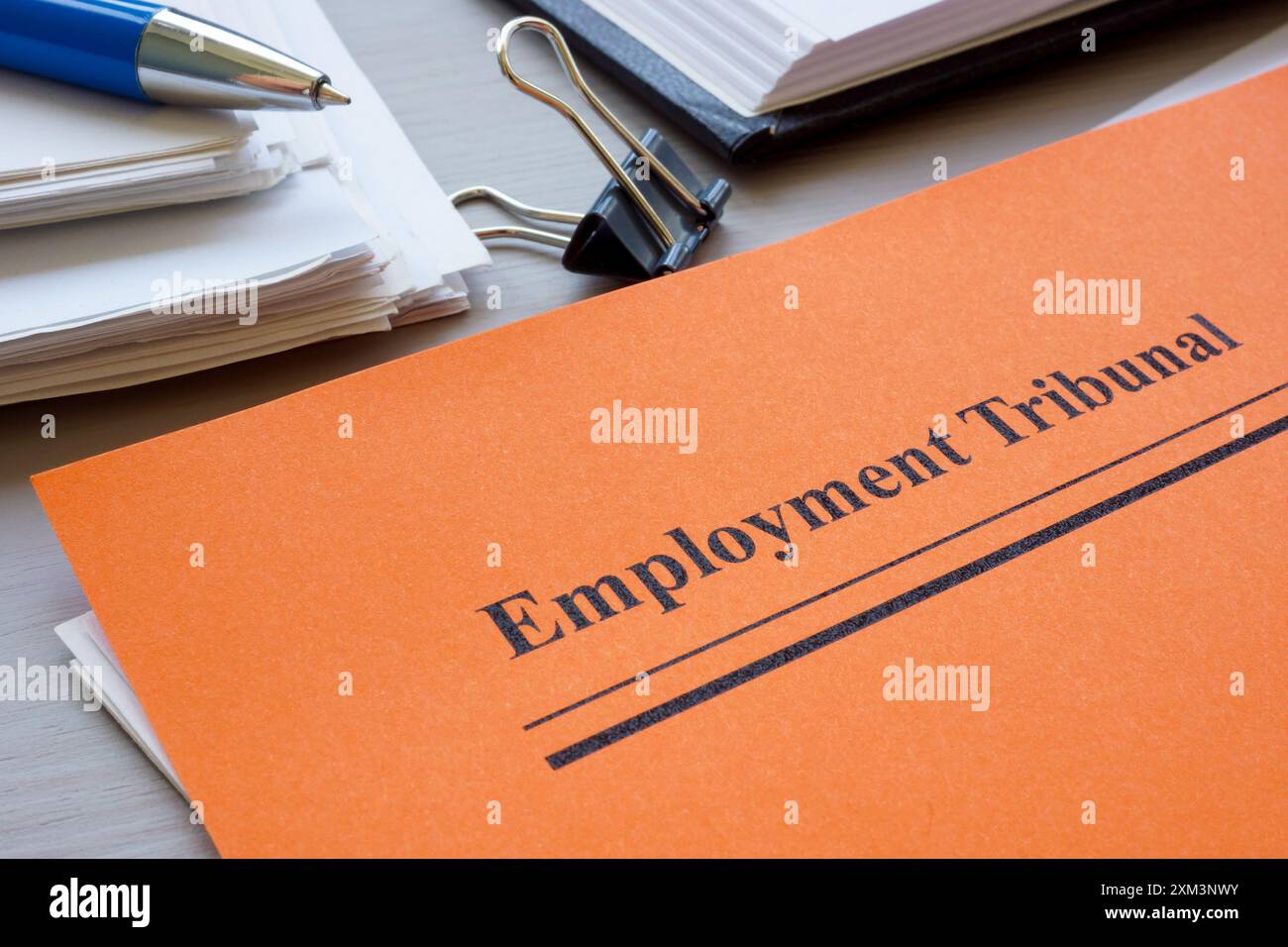 Stack of papers and employment tribunal documents Stock Photo - Alamy