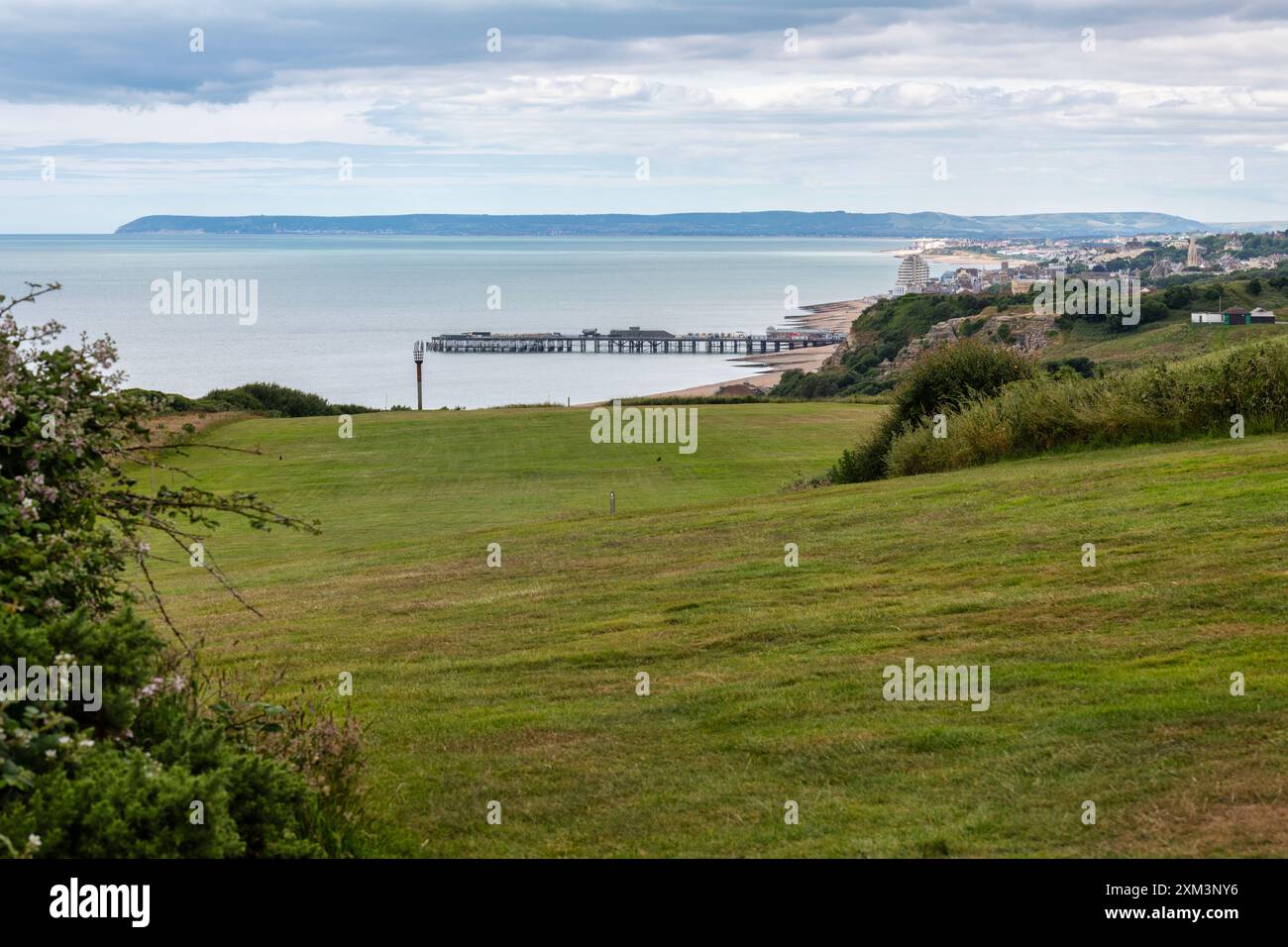 View of Hastings and its Pier from the East Cliffs in East Sussex in ...