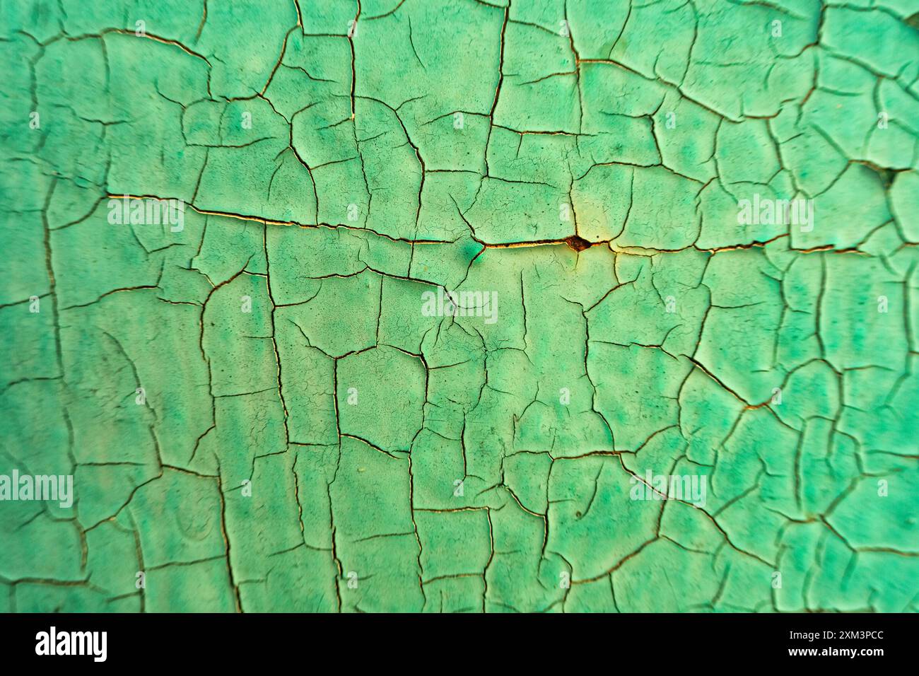 Weathered cracked green iron metallic with rusted textured background ...