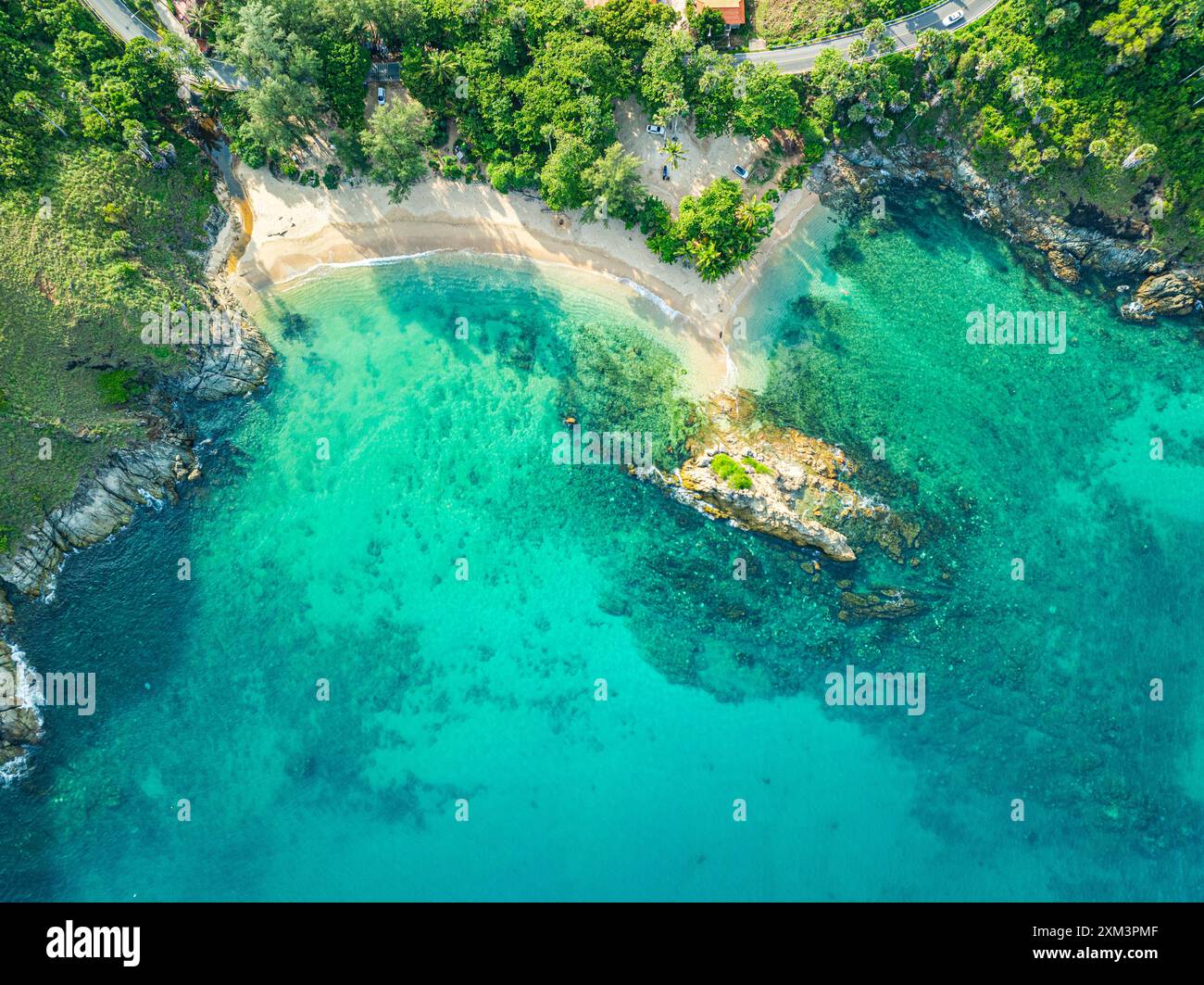aerial top view above small island in front of Yanui beach in low tide ...