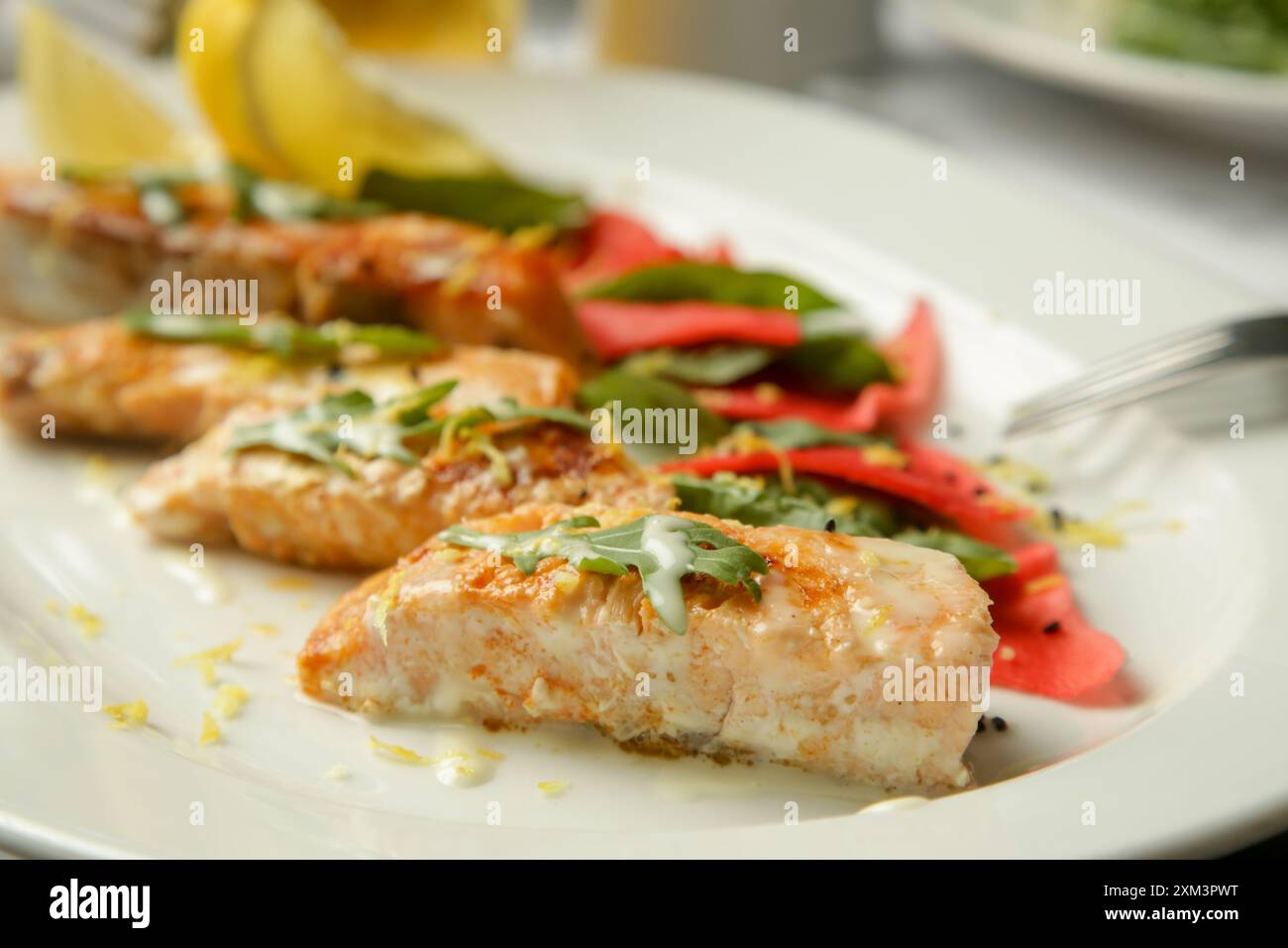 Grilled Salmon fillet with marinated vegetables served on the ...