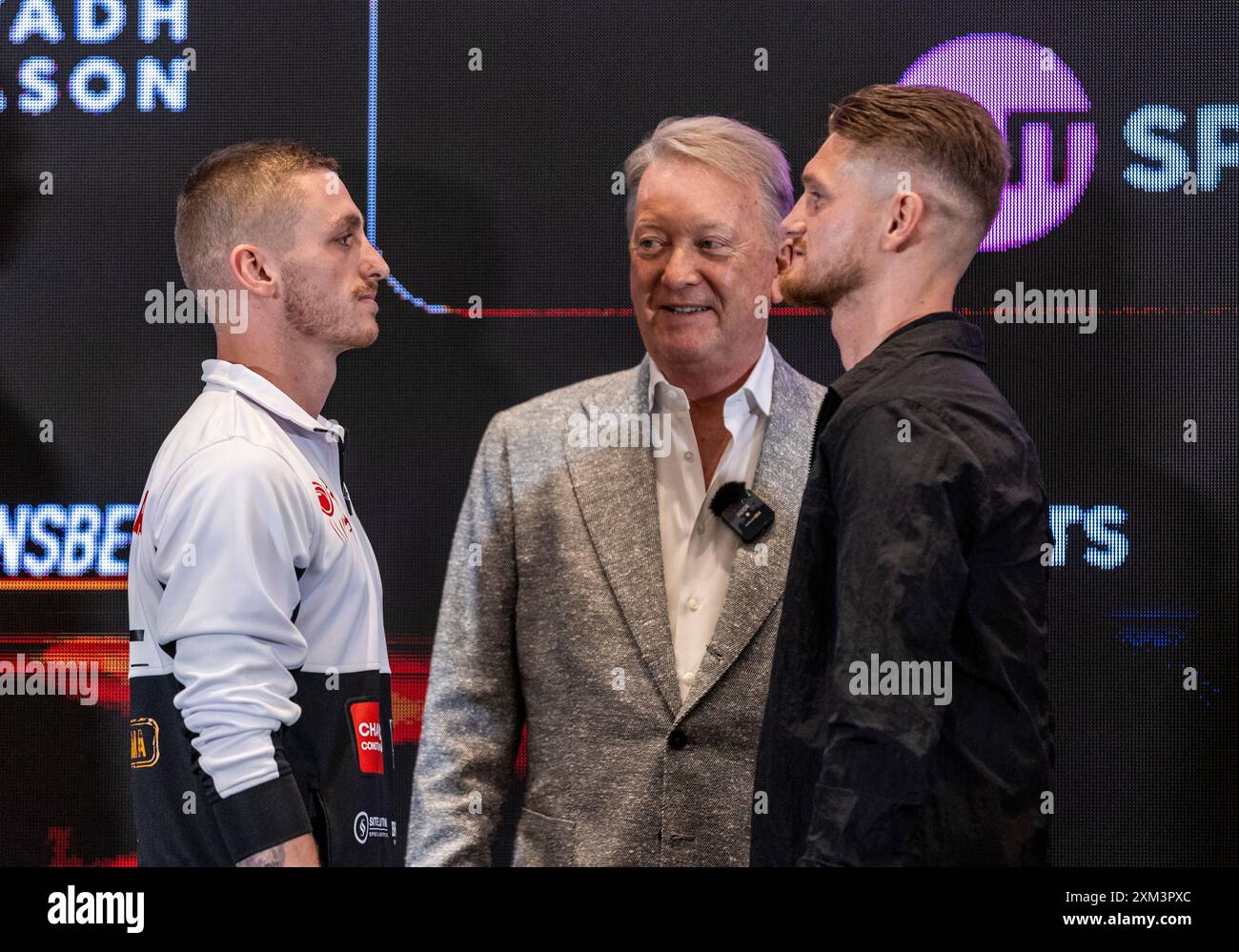 Promoter Frank Warren with Ryan Garner and Archie Sharp during the head ...
