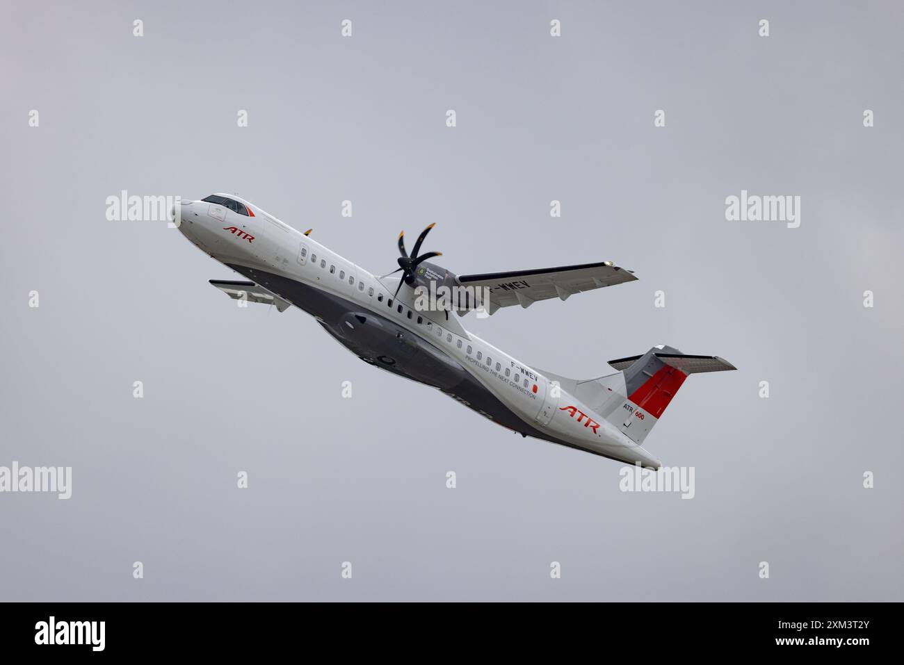 ATR 72-600 passenger jet flying at the 2024 Farnborough International ...