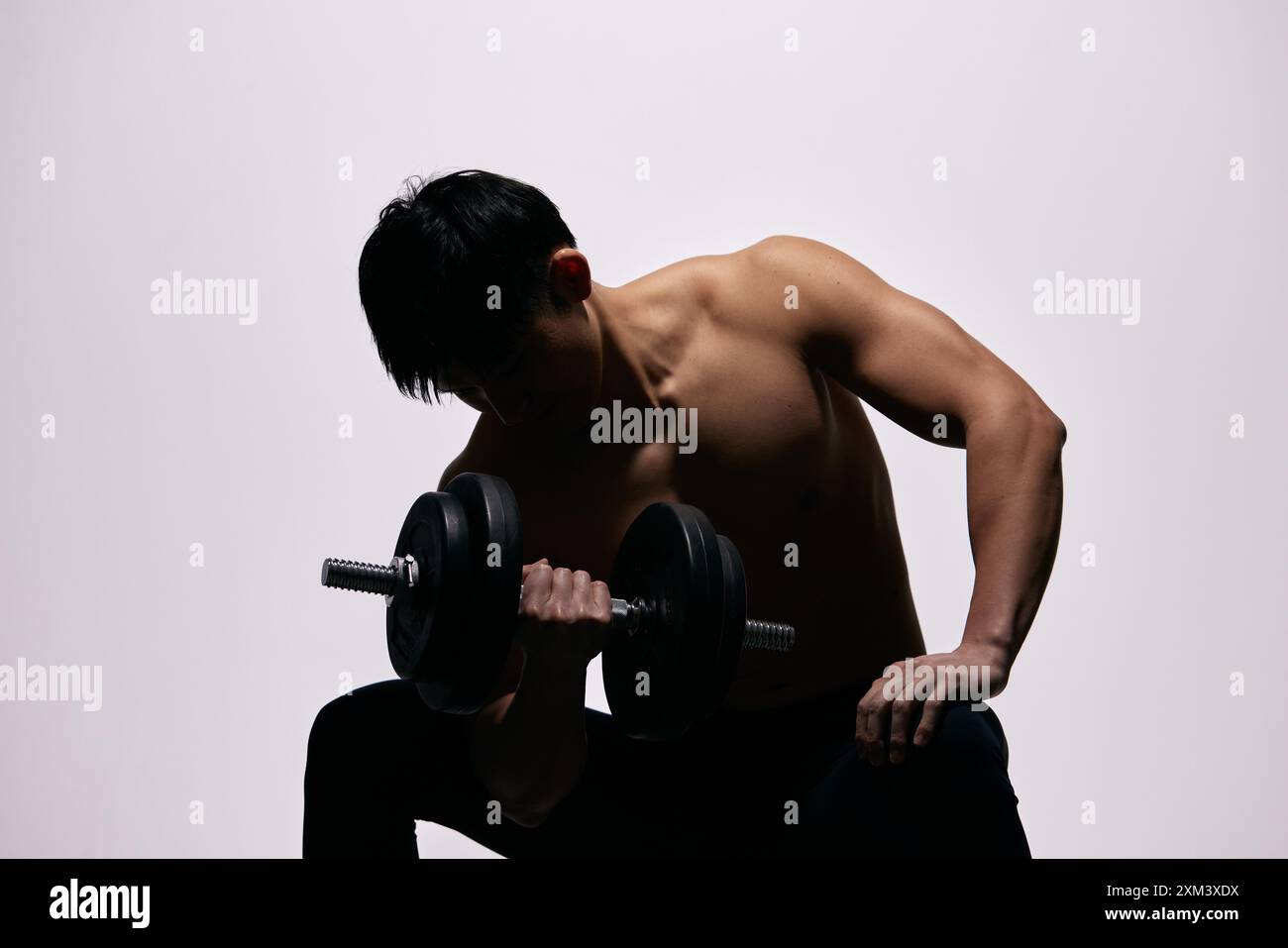 Fat man lifting dumbbell hi-res stock photography and images - Alamy