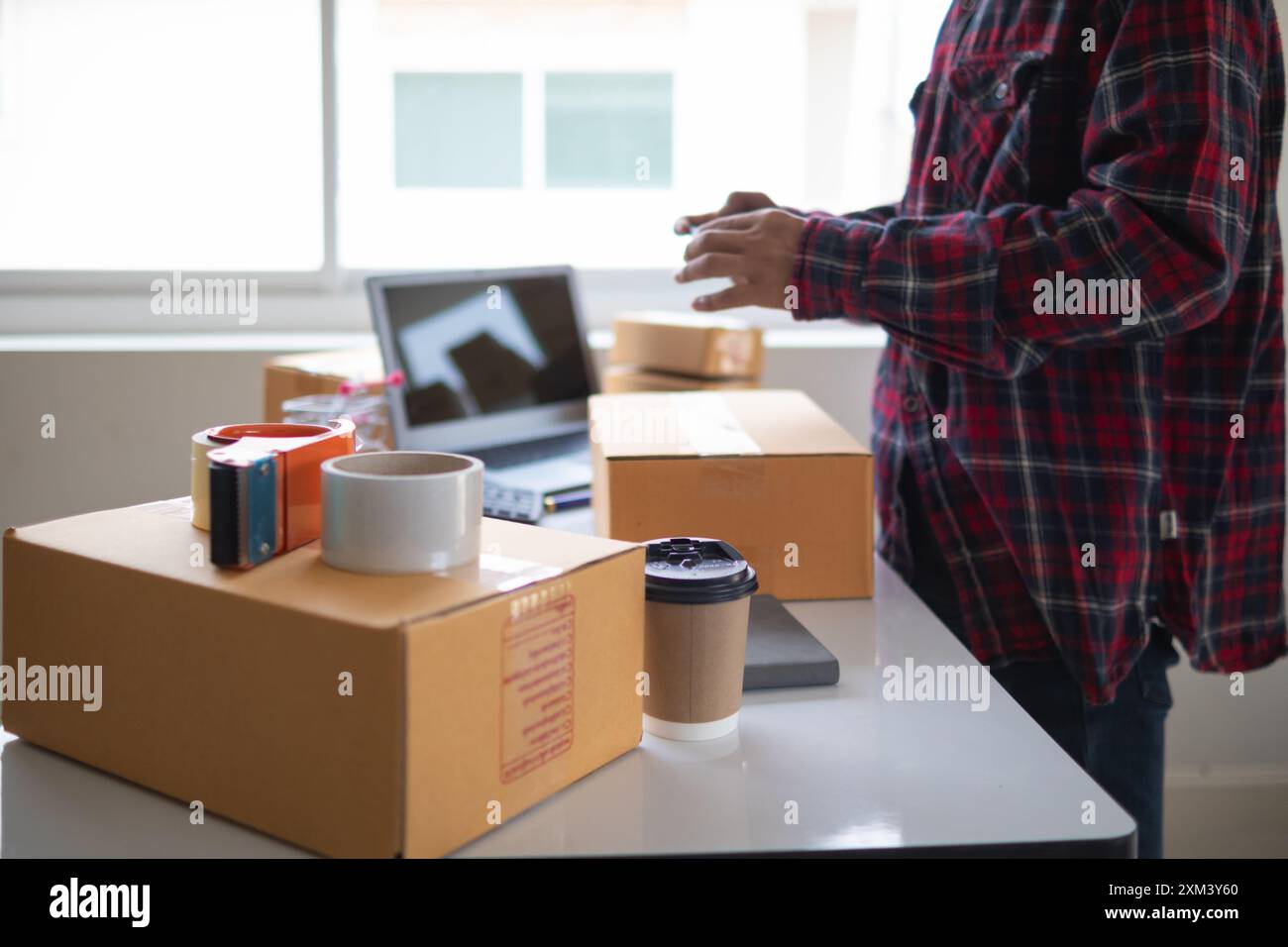 parcel boxes being packaged and ready to be sent to customers who have ...