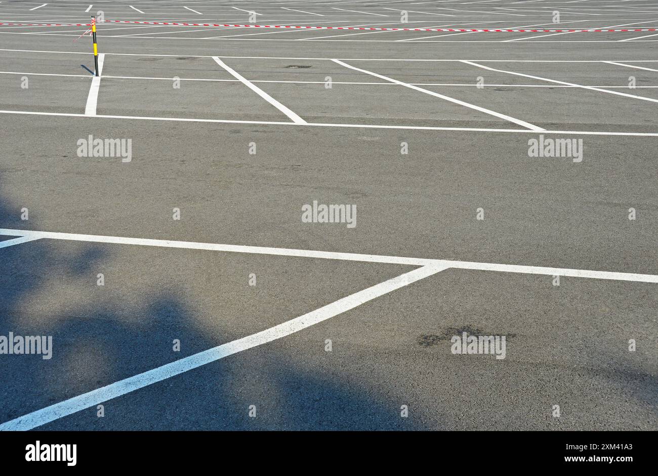 An empty parking lot with freshly painted markings Stock Photo - Alamy