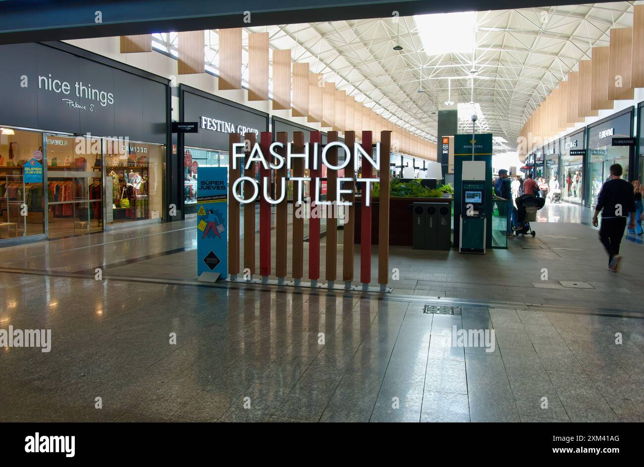 Entrance to the Fashion Outlet shopping centre pedestrianised covered ...