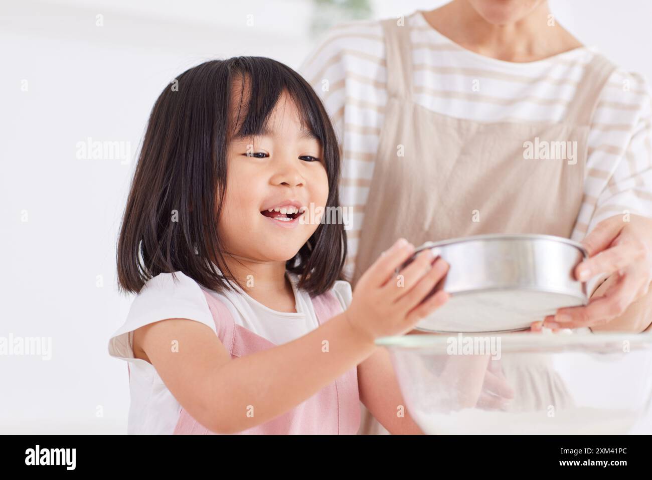 Japanese mother and daughter cooking in the kitchen Stock Photo - Alamy