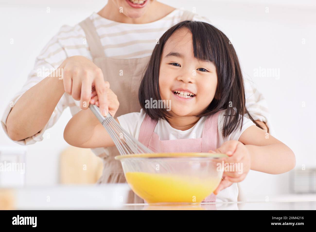 Japanese mother and daughter cooking in the kitchen Stock Photo - Alamy