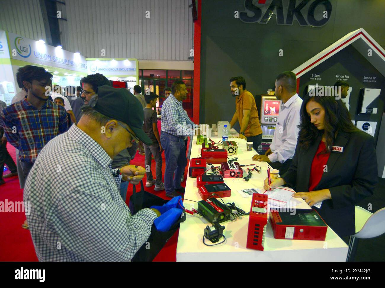 Visitors take keen interest at stall during the International Solar ...