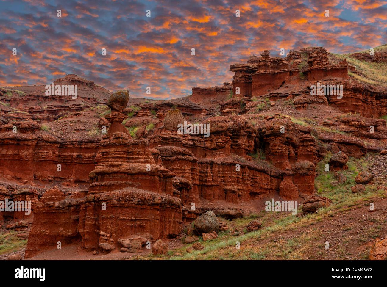 Red fairy chimneys shaped like formations that are millions of years ...