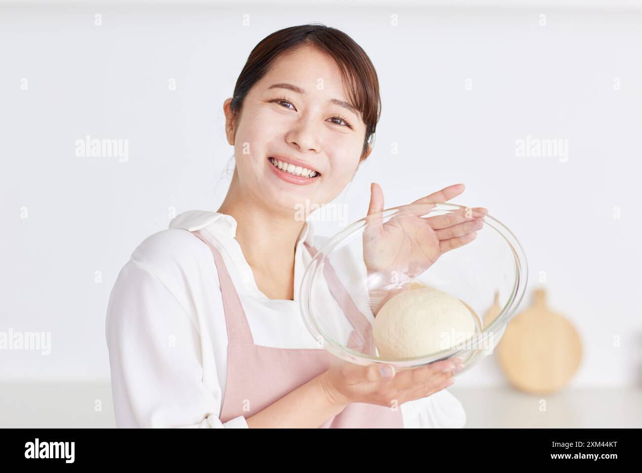Japanese woman cooking in the kitchen Stock Photo - Alamy