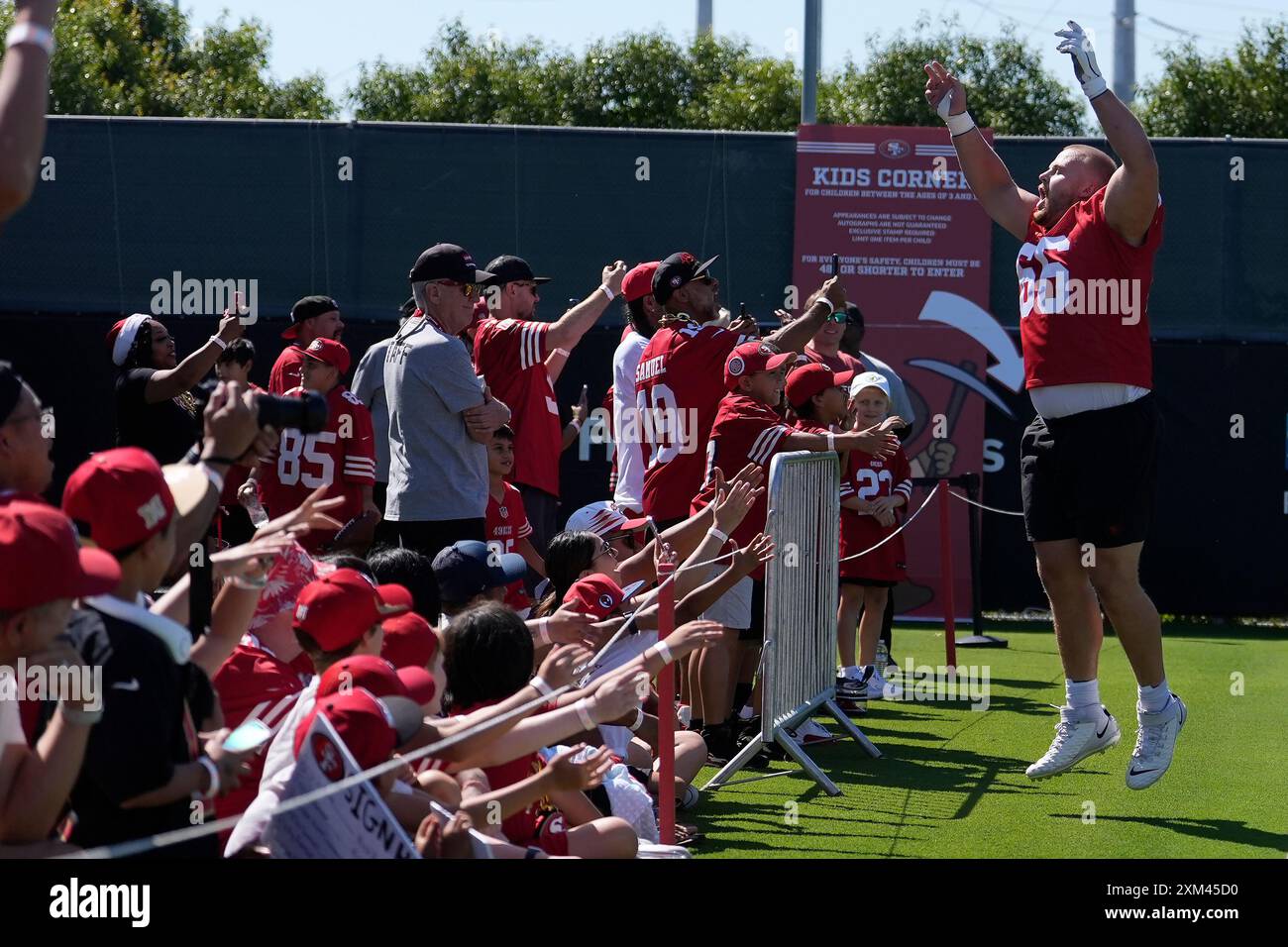 San Francisco 49ers offensive lineman Drake Nugent, right, gestures ...
