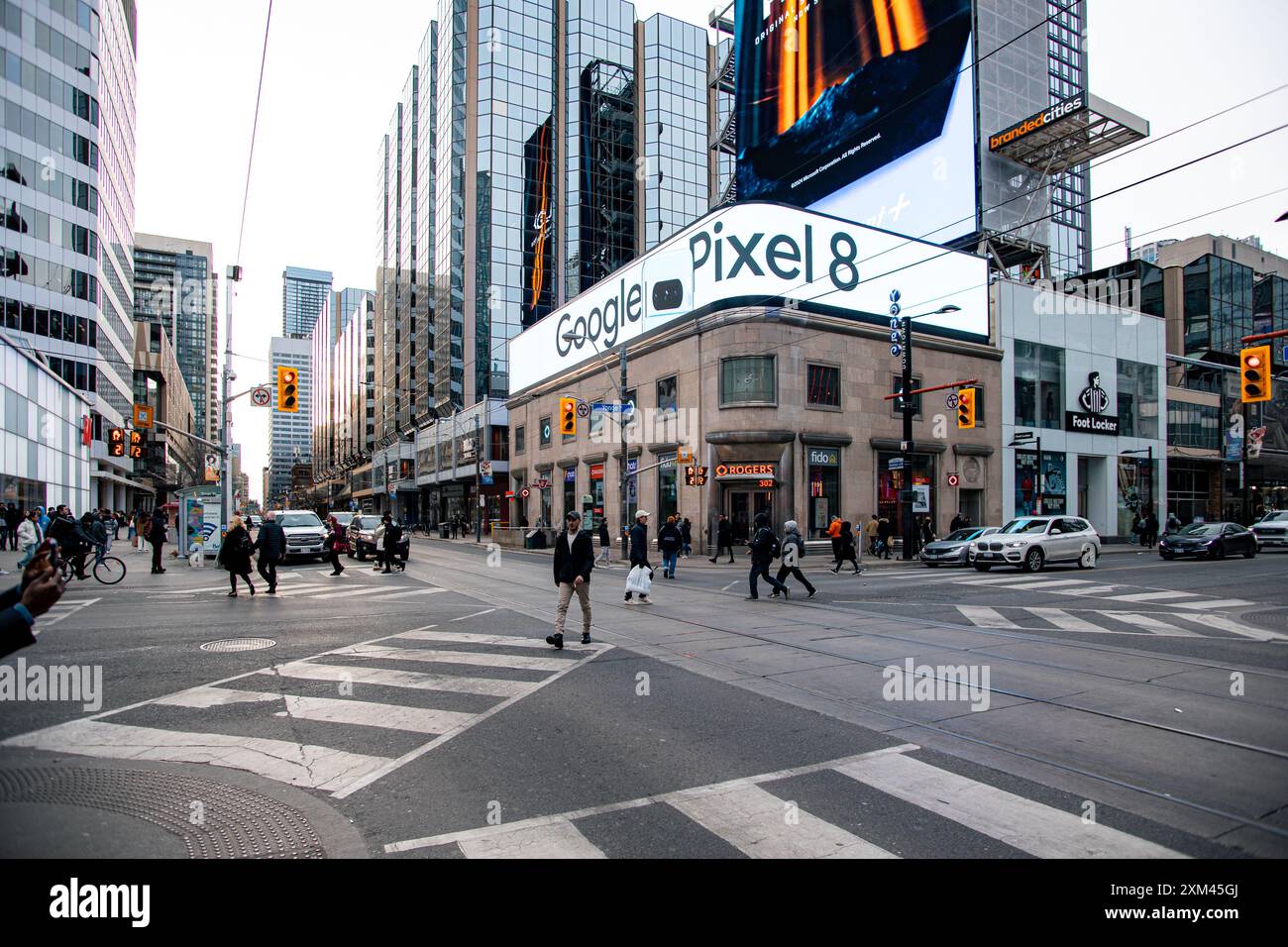 Photo of crosswalk at Dundas Square in Toronto, with billboard on ...