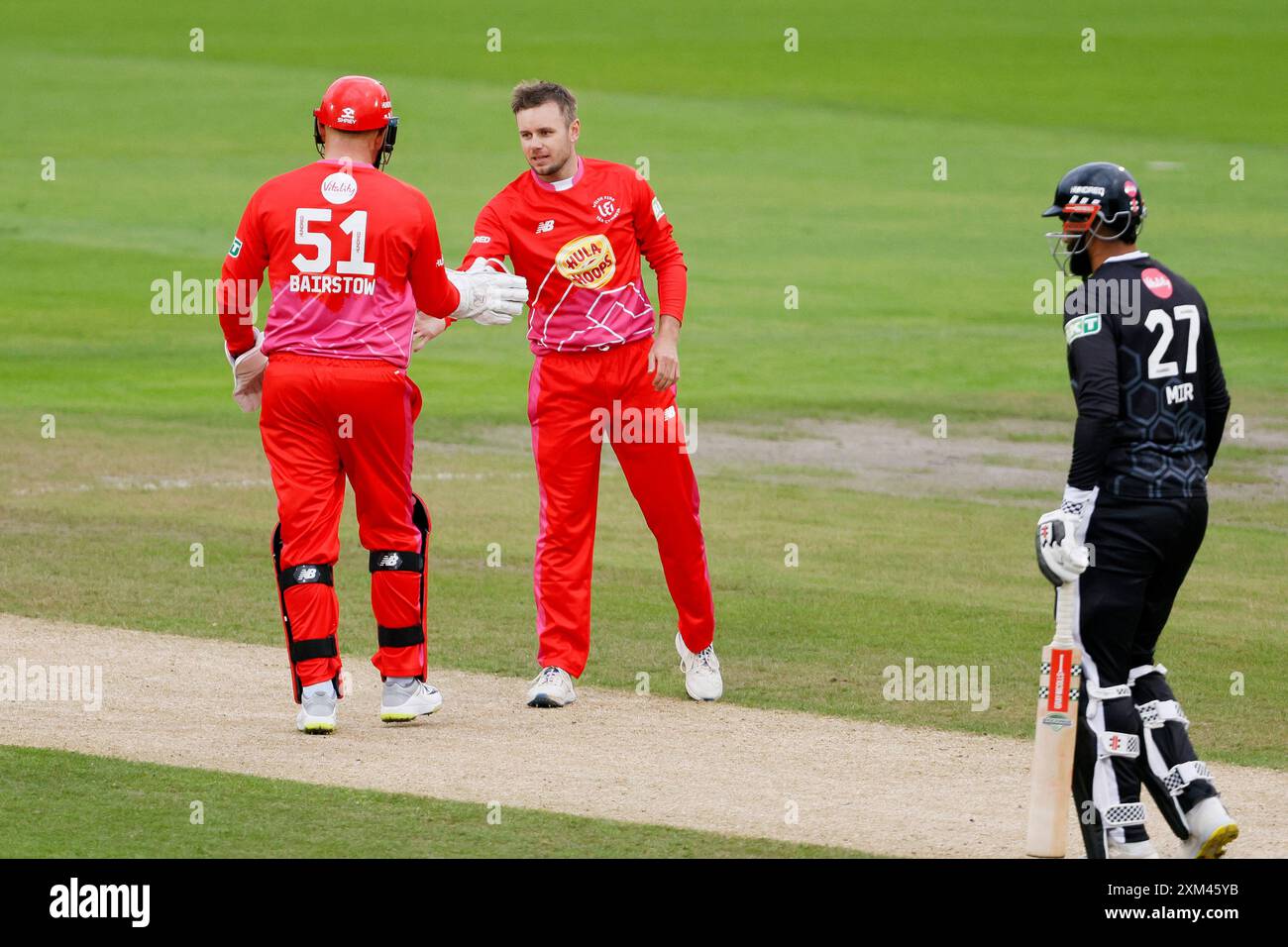 Welsh Fire's Mason Crane celebrates with Jonny Bairstow (left) after ...