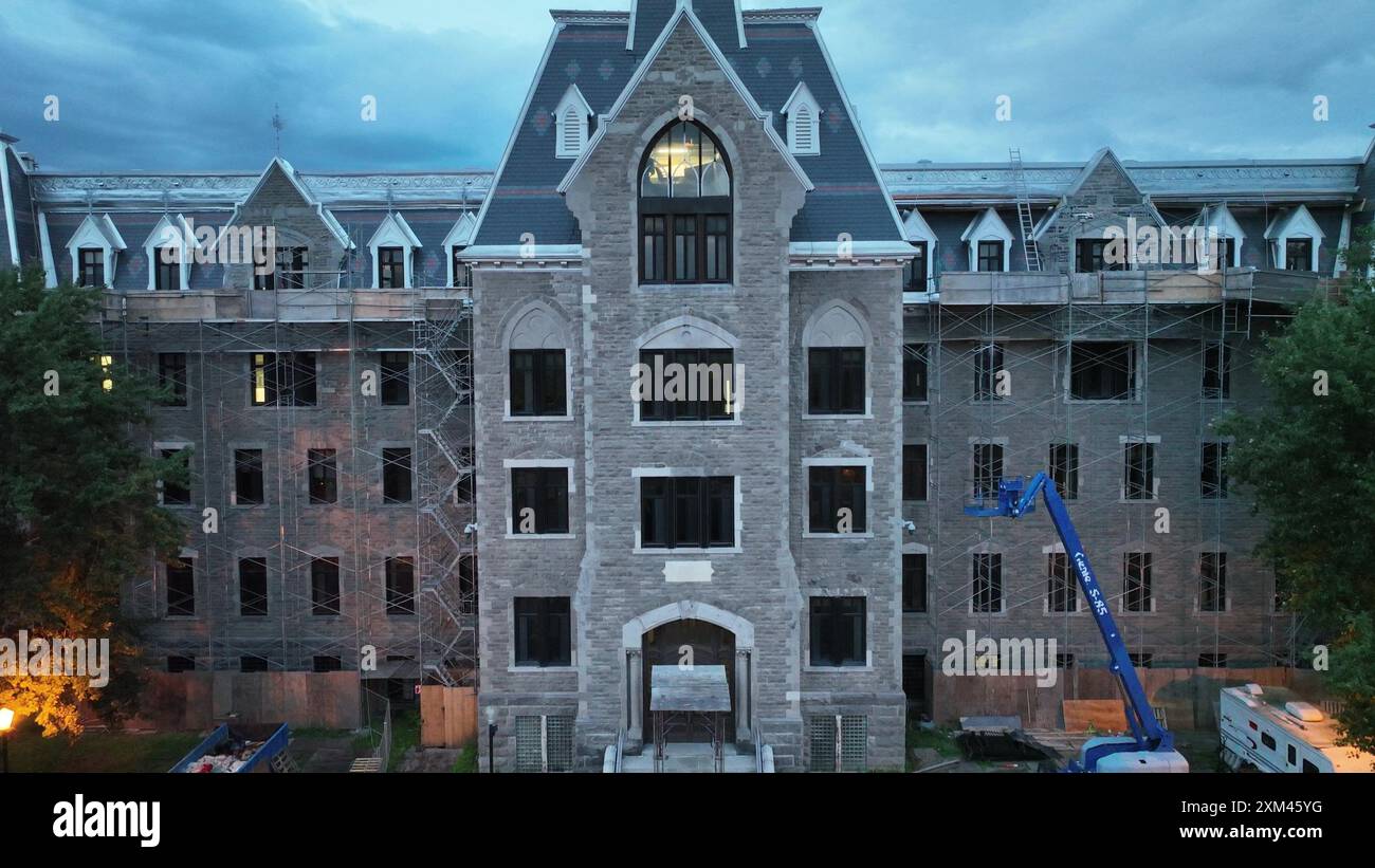 A historic building under renovation with scaffolding and construction ...