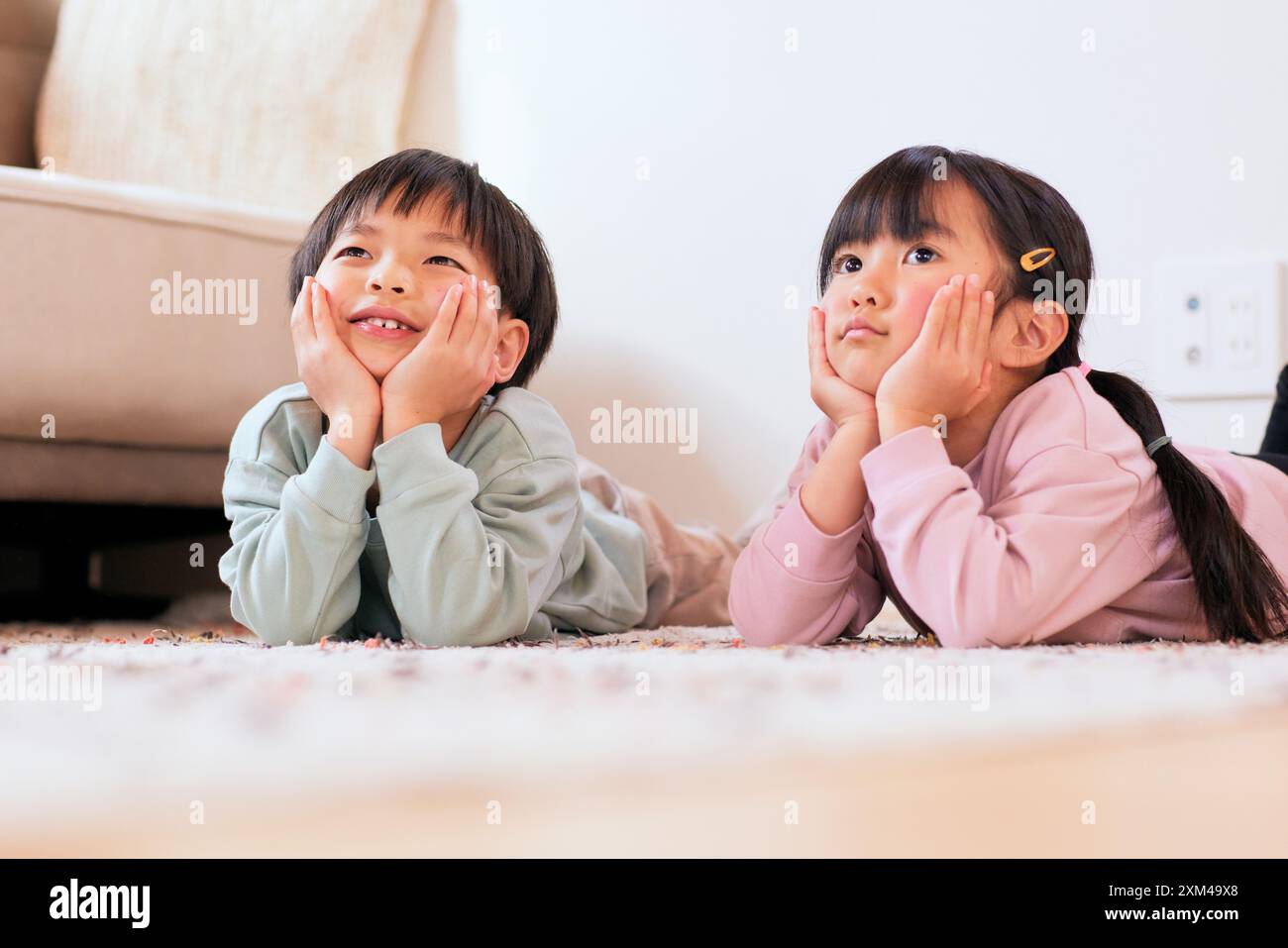 Happy Japanese kids playing on the floor Stock Photo - Alamy