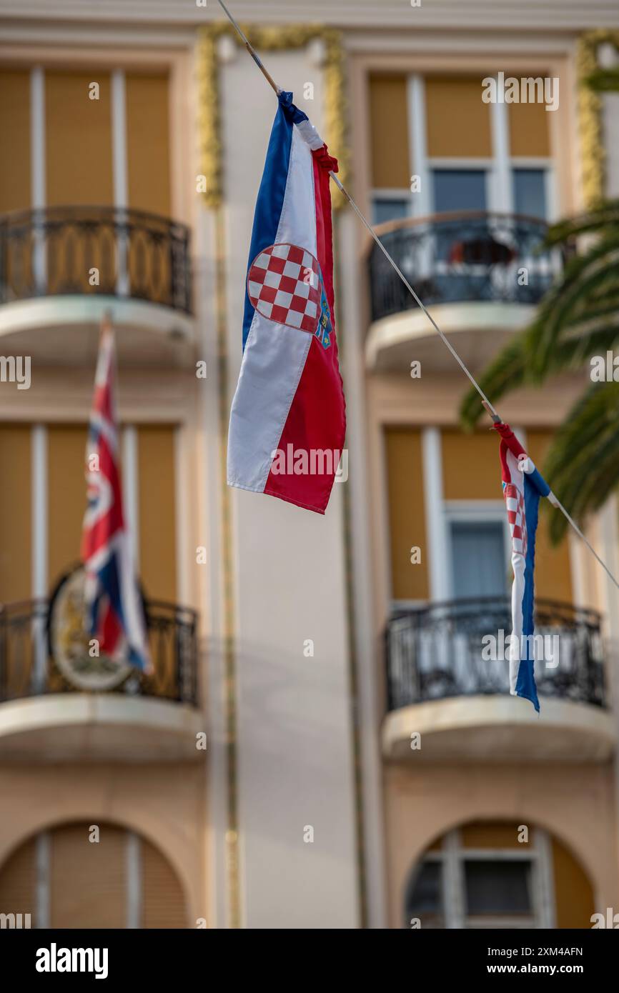 croatian flag hanging outside of an important government building with ...