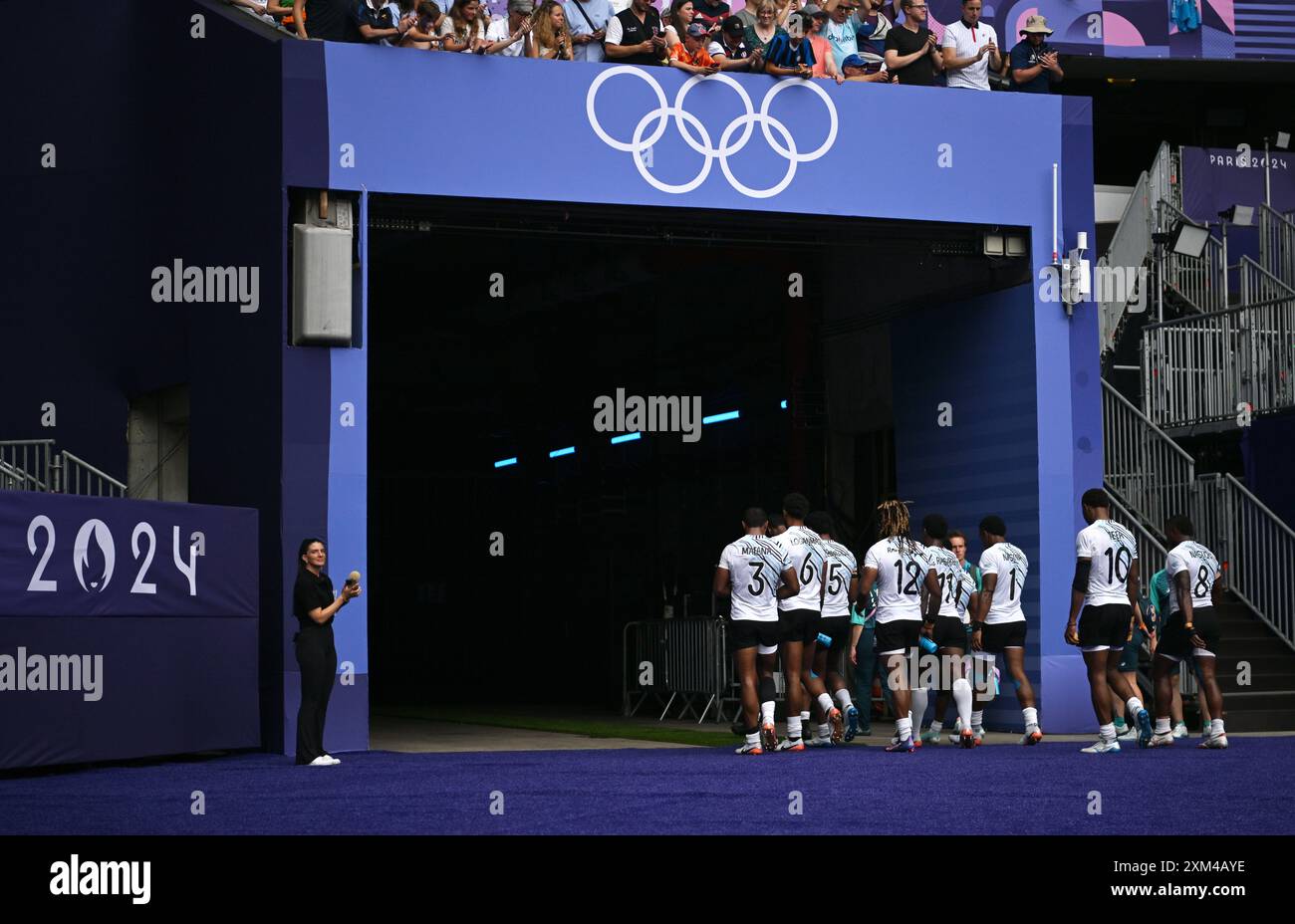Paris, France. 25th July, 2024. Players of Fiji leave the play field ...