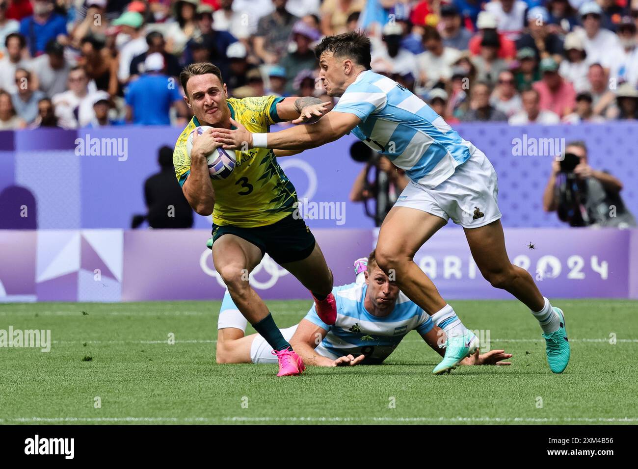 Paris, France, 25 July, 2024. Corey Toole (3) of Team Australia runs ...