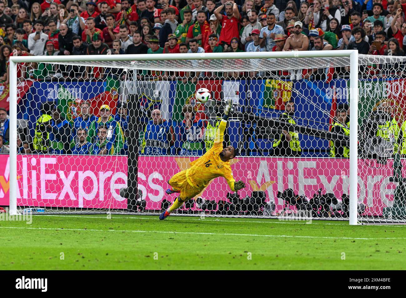 goalkeeper Mike Maignan (16) of France defeated in the penalty series ...