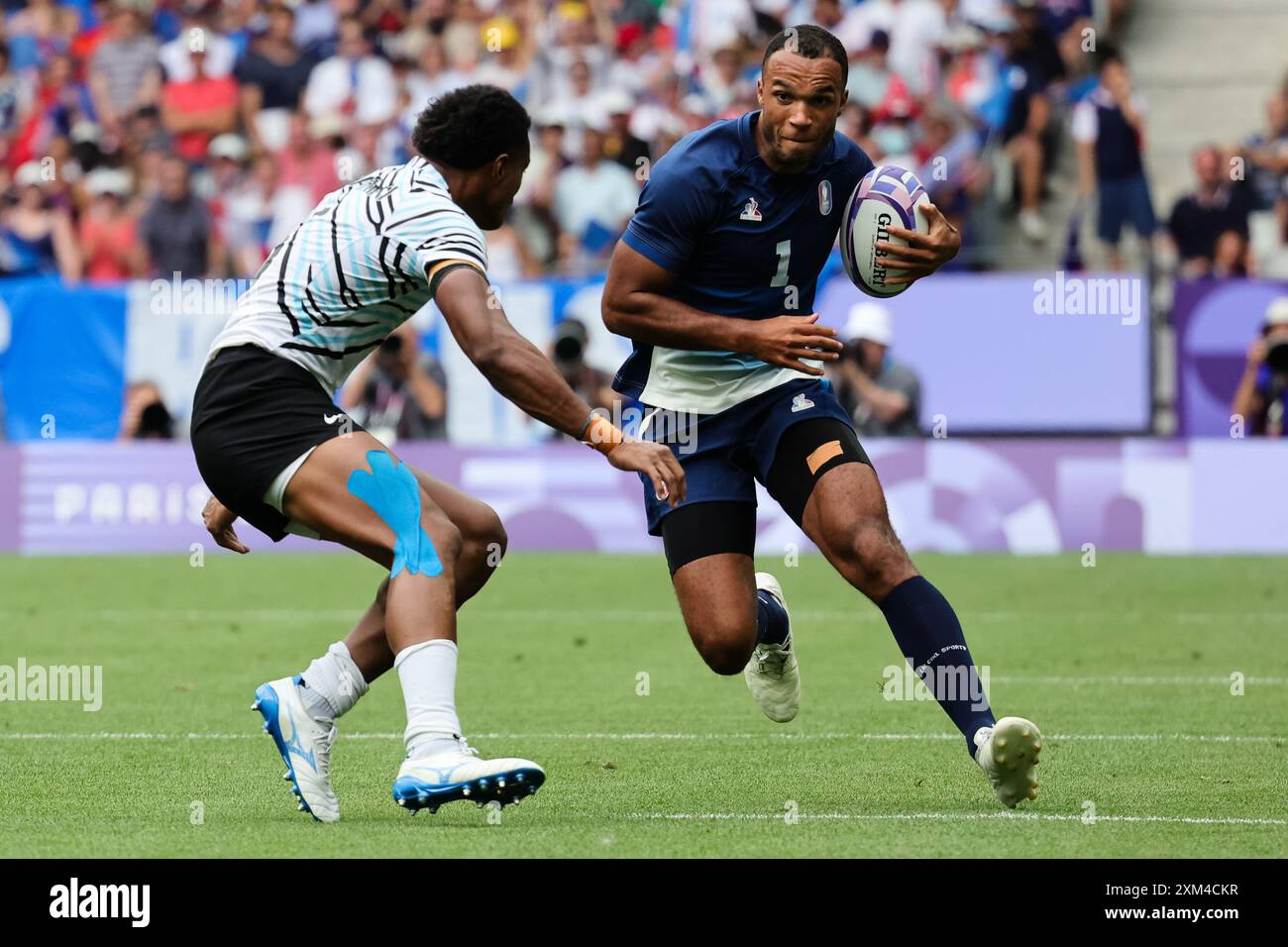 Paris, France, 25 July, 2024. Varian Pasquet (1) of Team France runs ...